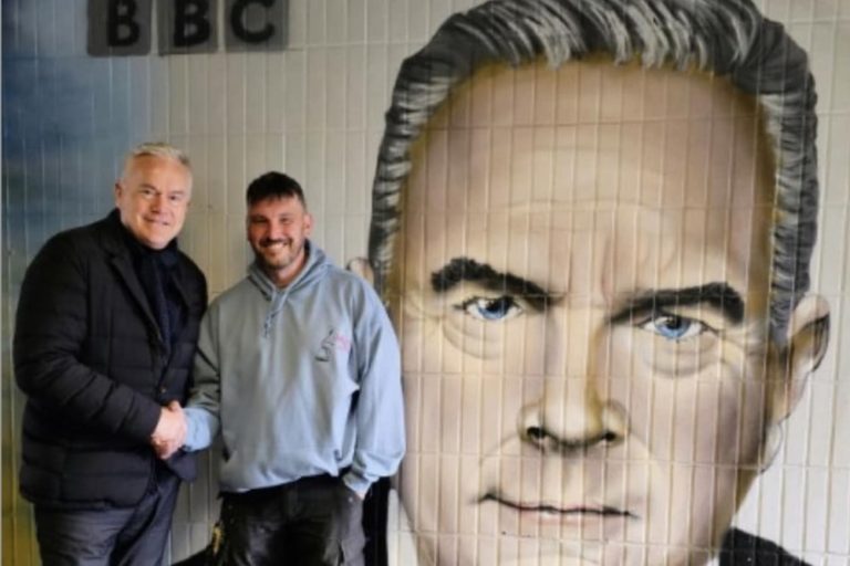 Street artist paints over hometown mural of Huw Edwards