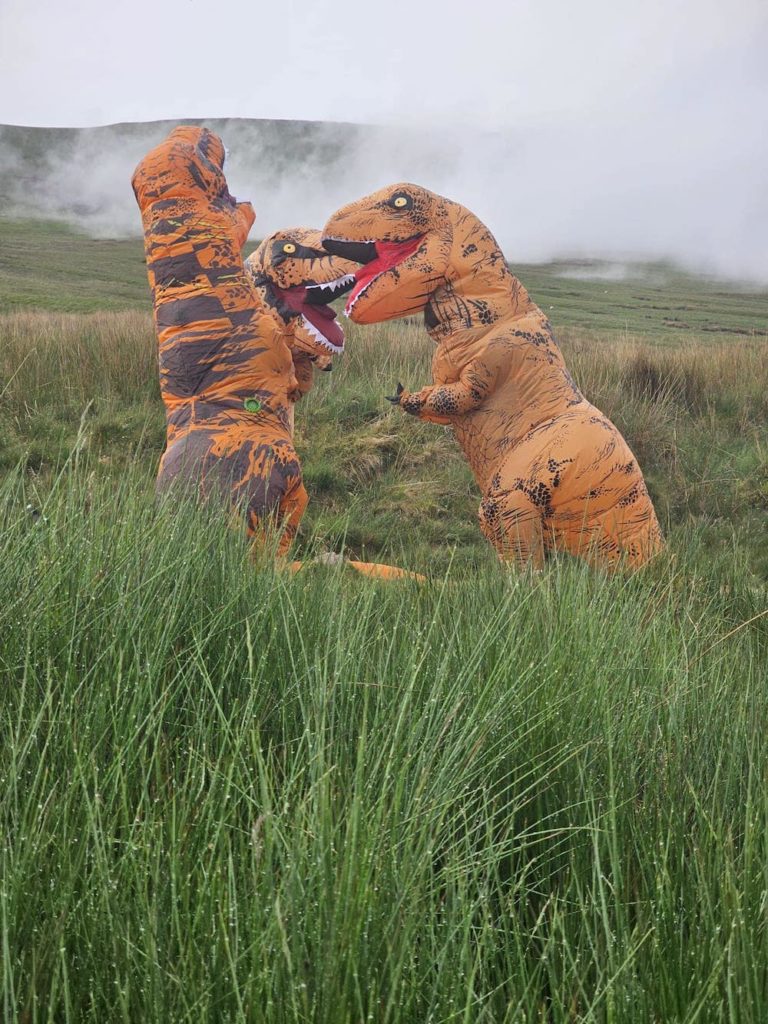 Watch: The hilarious videos of 'dinosaurs' climbing Pen y Fan
