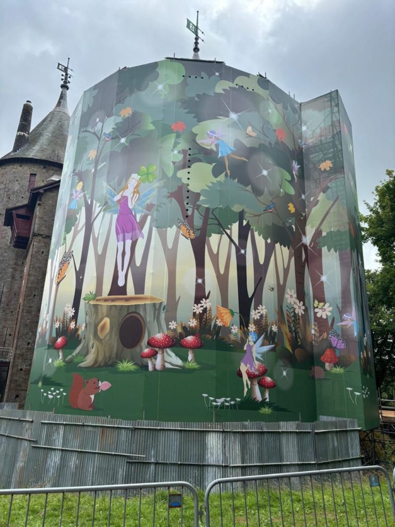 Fairytale castle wraps tower in a magical banner