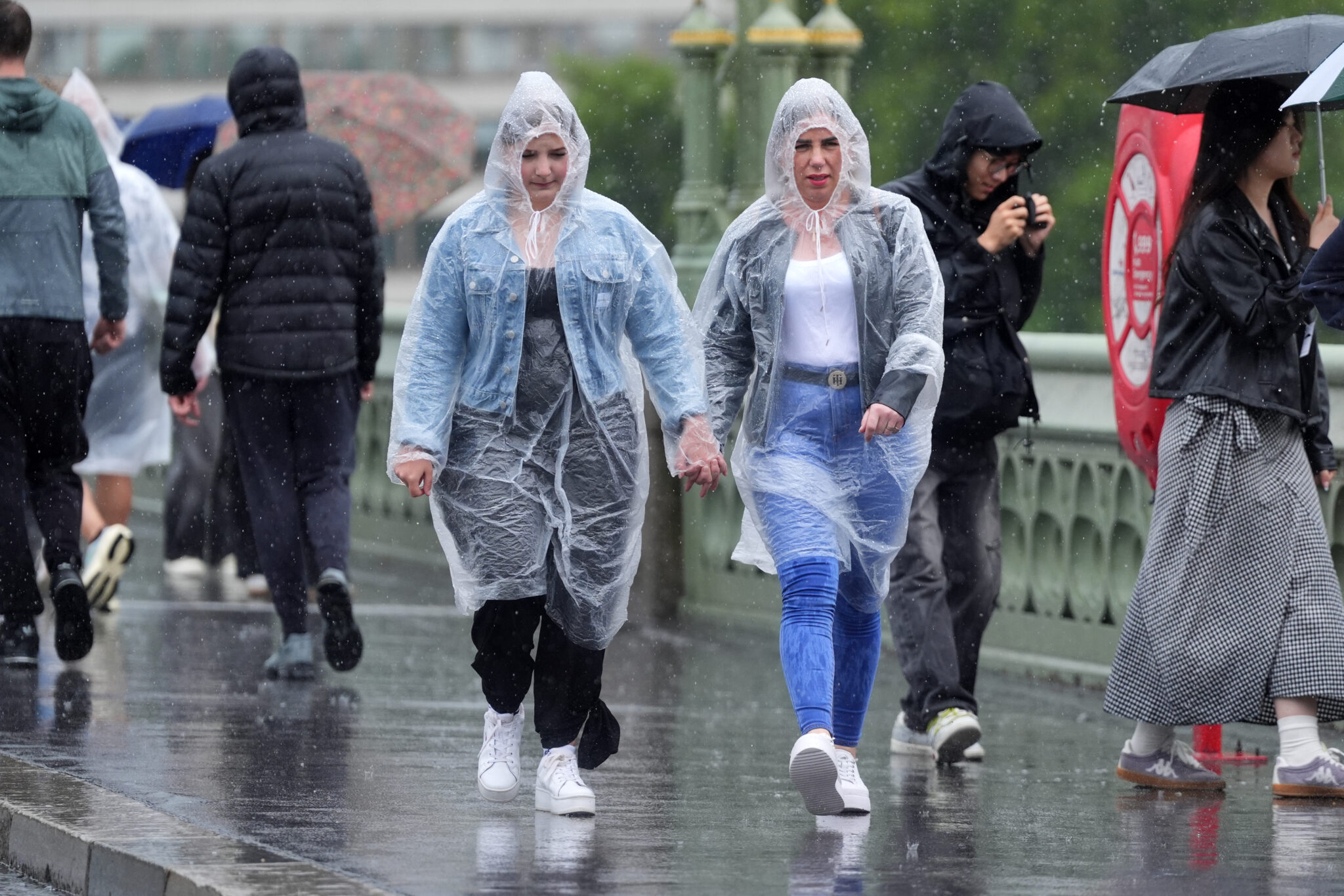 UK braced for thunderstorms with risk of flood damage in south-west Wales