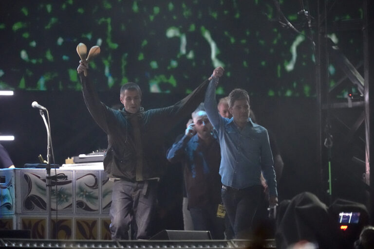 Oasis take to stage for first gig in 16 years to jumping crowd and ...